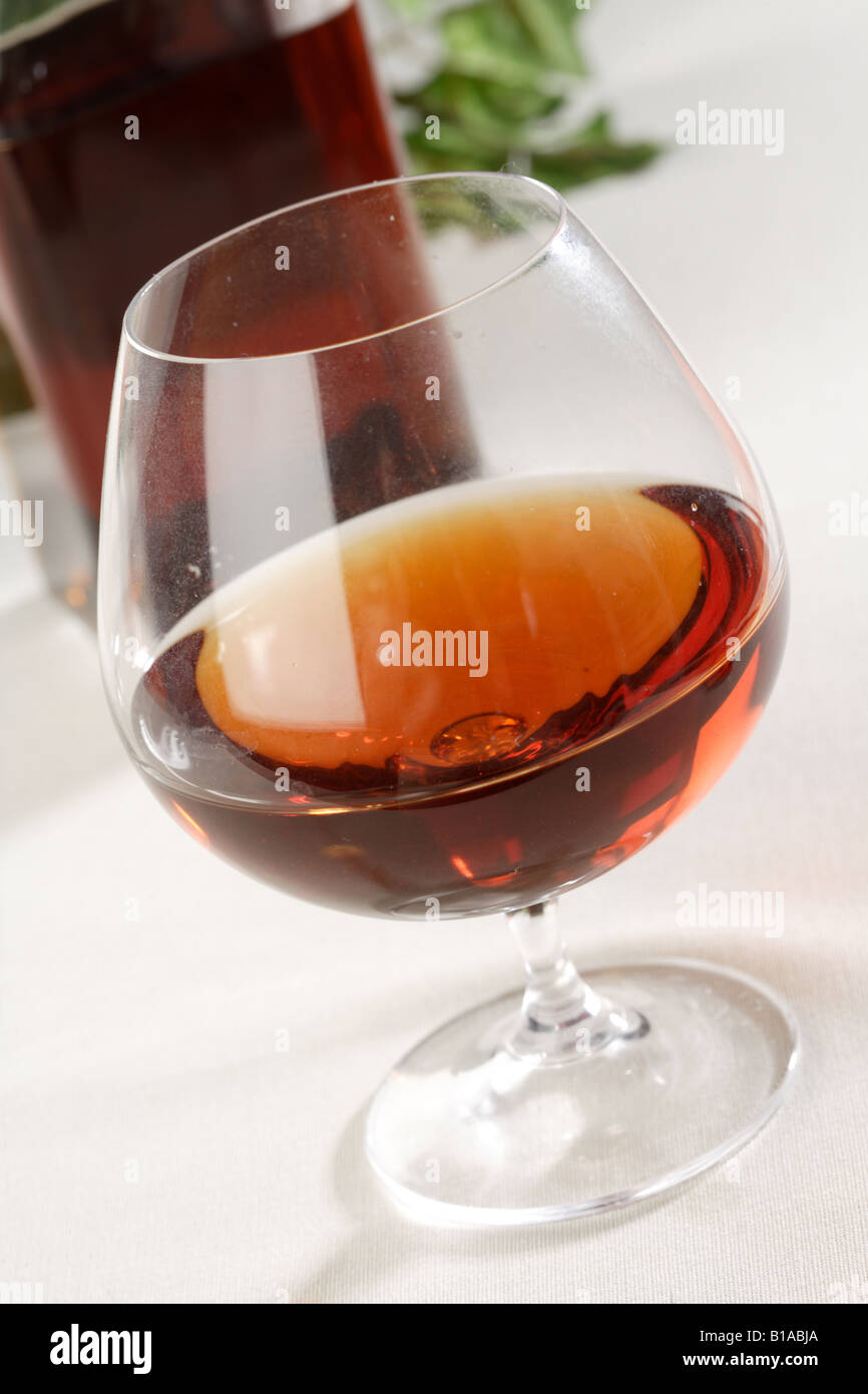 Glass of patxaran (vertical Stock Photo - Alamy