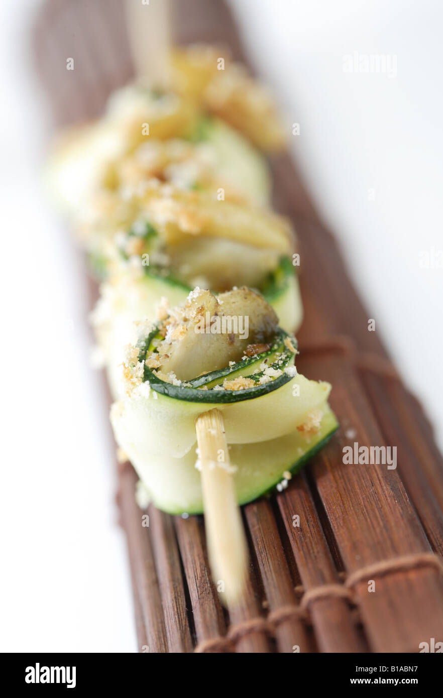 Brochette of clams and courgette (vertical Stock Photo - Alamy
