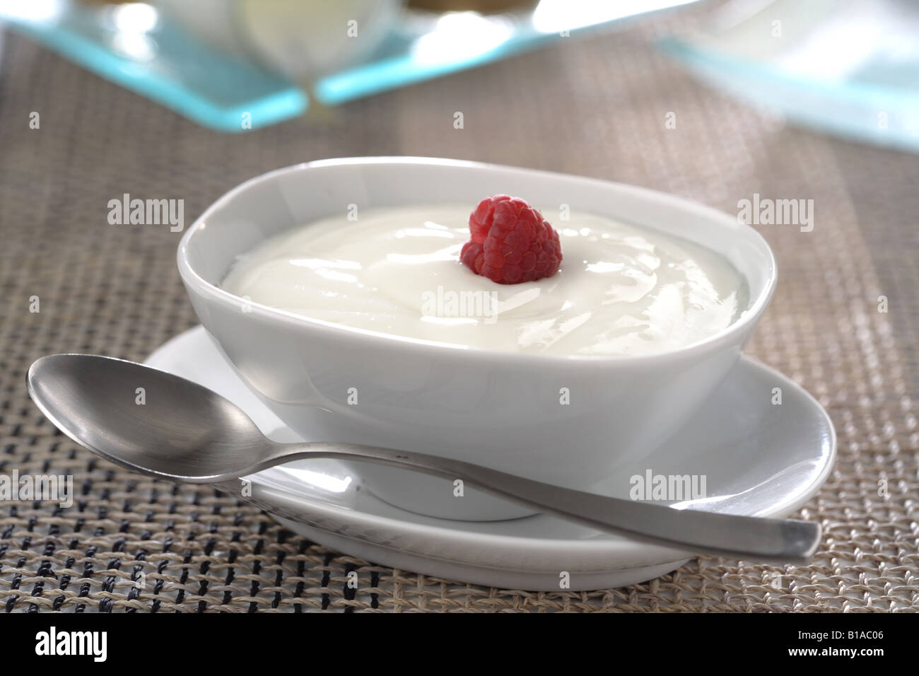 Bowl with natural yoghurt Stock Photo - Alamy