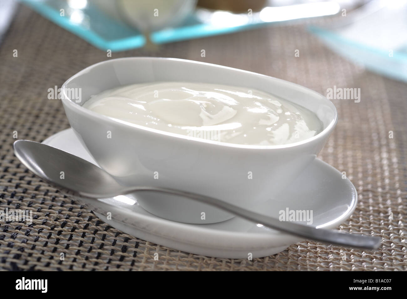 Bowl with natural yoghurt Stock Photo - Alamy