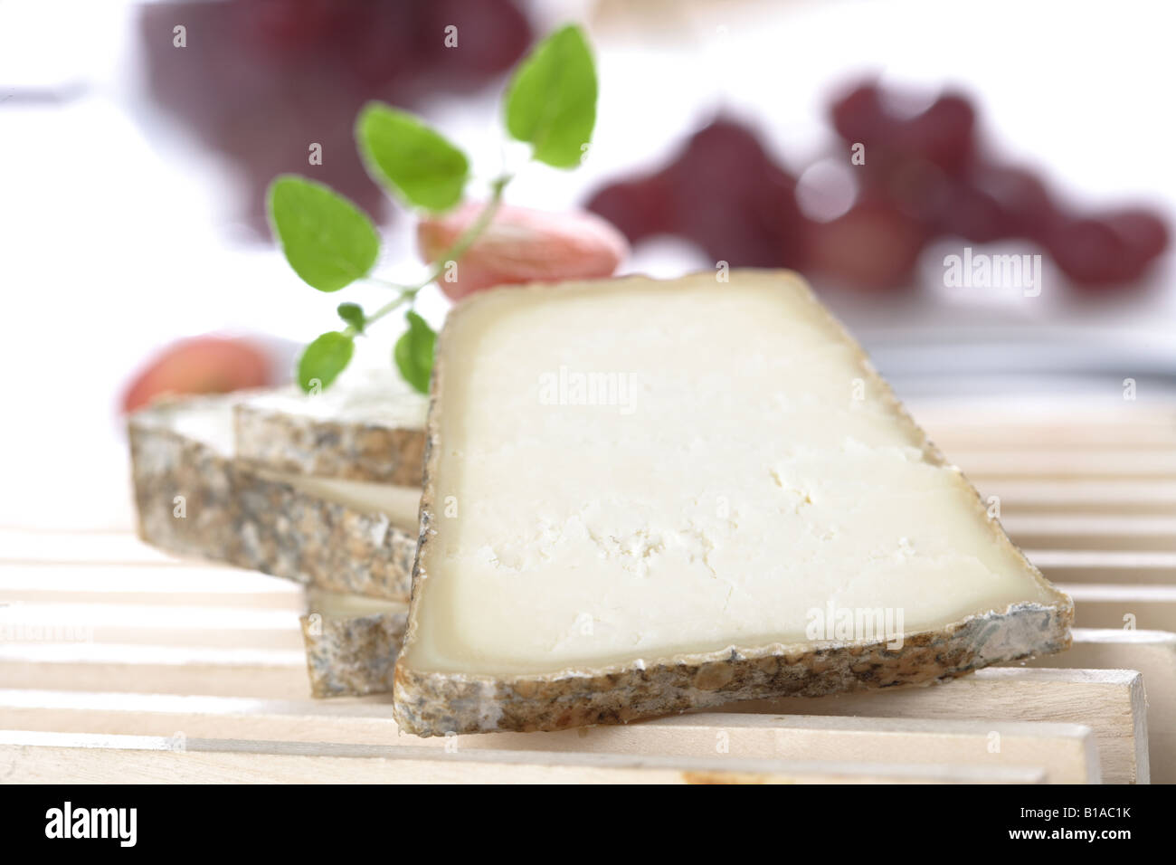 Sliced goat cheese Stock Photo - Alamy