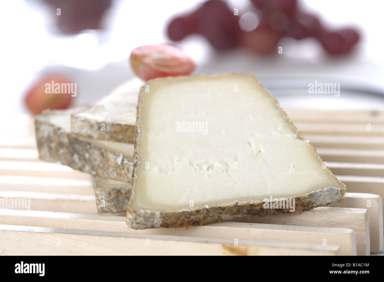 Sliced goat cheese Stock Photo - Alamy