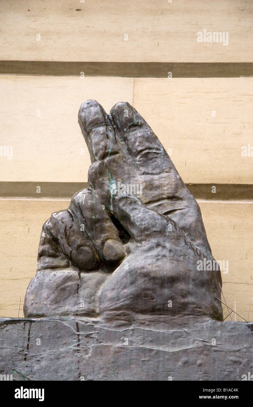 A brass sculpture shows two raised fingers in Stuttgart, Germany Stock ...