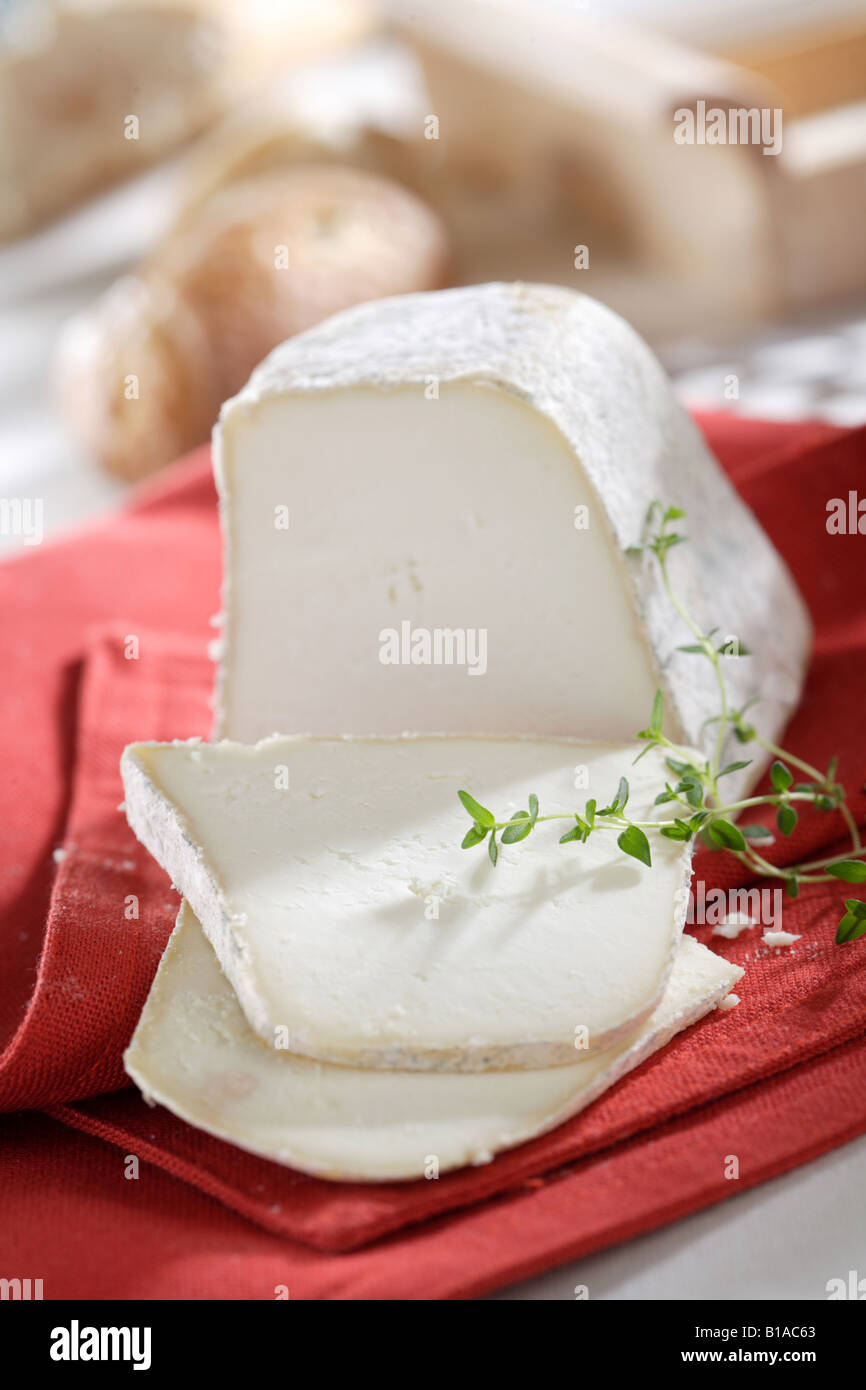 Sliced goat cheese dice (vertical Stock Photo - Alamy