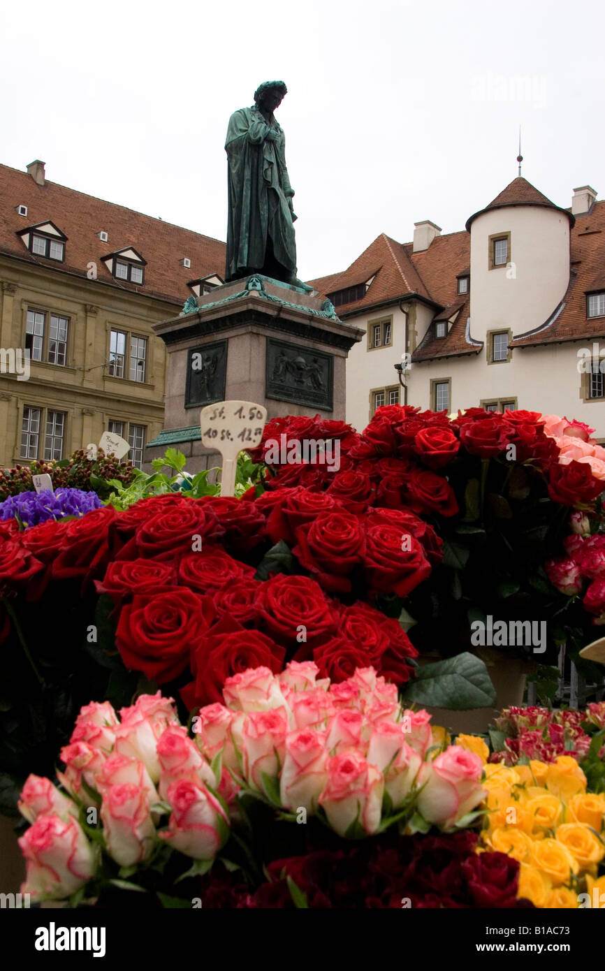 Market day in Stuttgart, Germany. Despite poor weather, flowers are ...