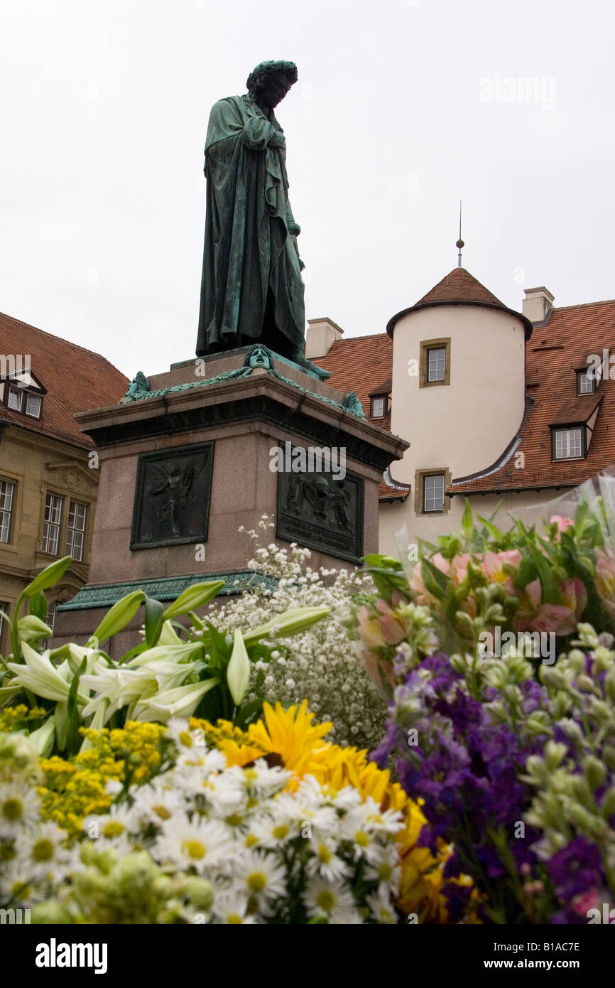 Market day in Stuttgart, Germany. Despite poor weather, flowers are ...