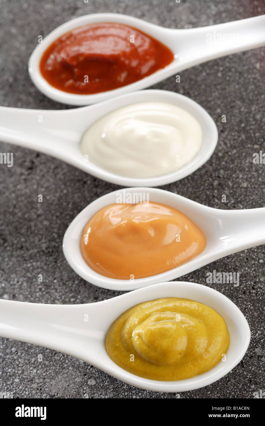 Teaspoons with sauces (zhenital, vertical Stock Photo - Alamy