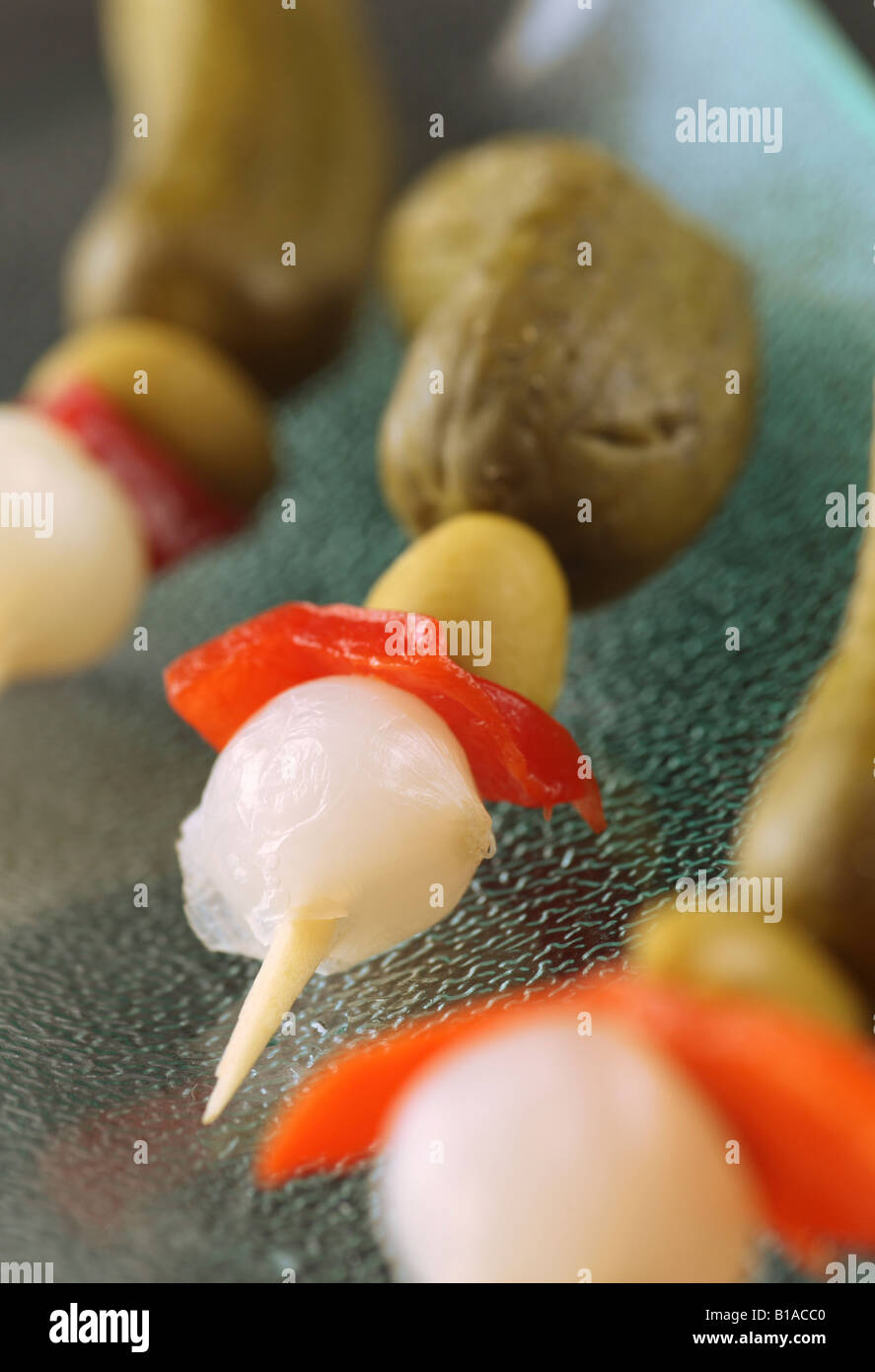 Close-up of banderillas (pickle skewers) (vertical Stock Photo - Alamy