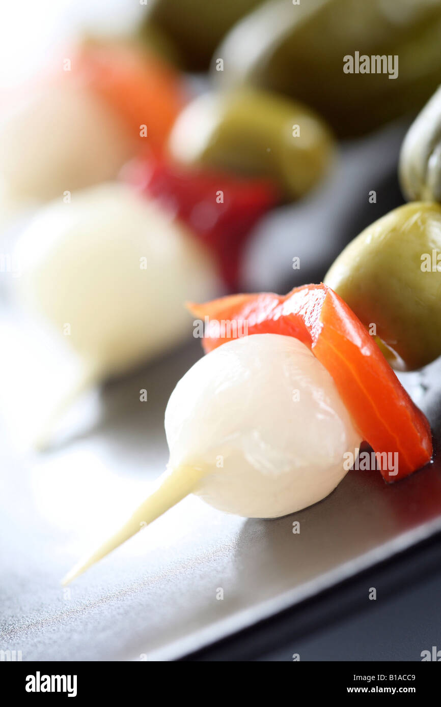 Close-up of banderillas (pickle skewers) (vertical Stock Photo - Alamy