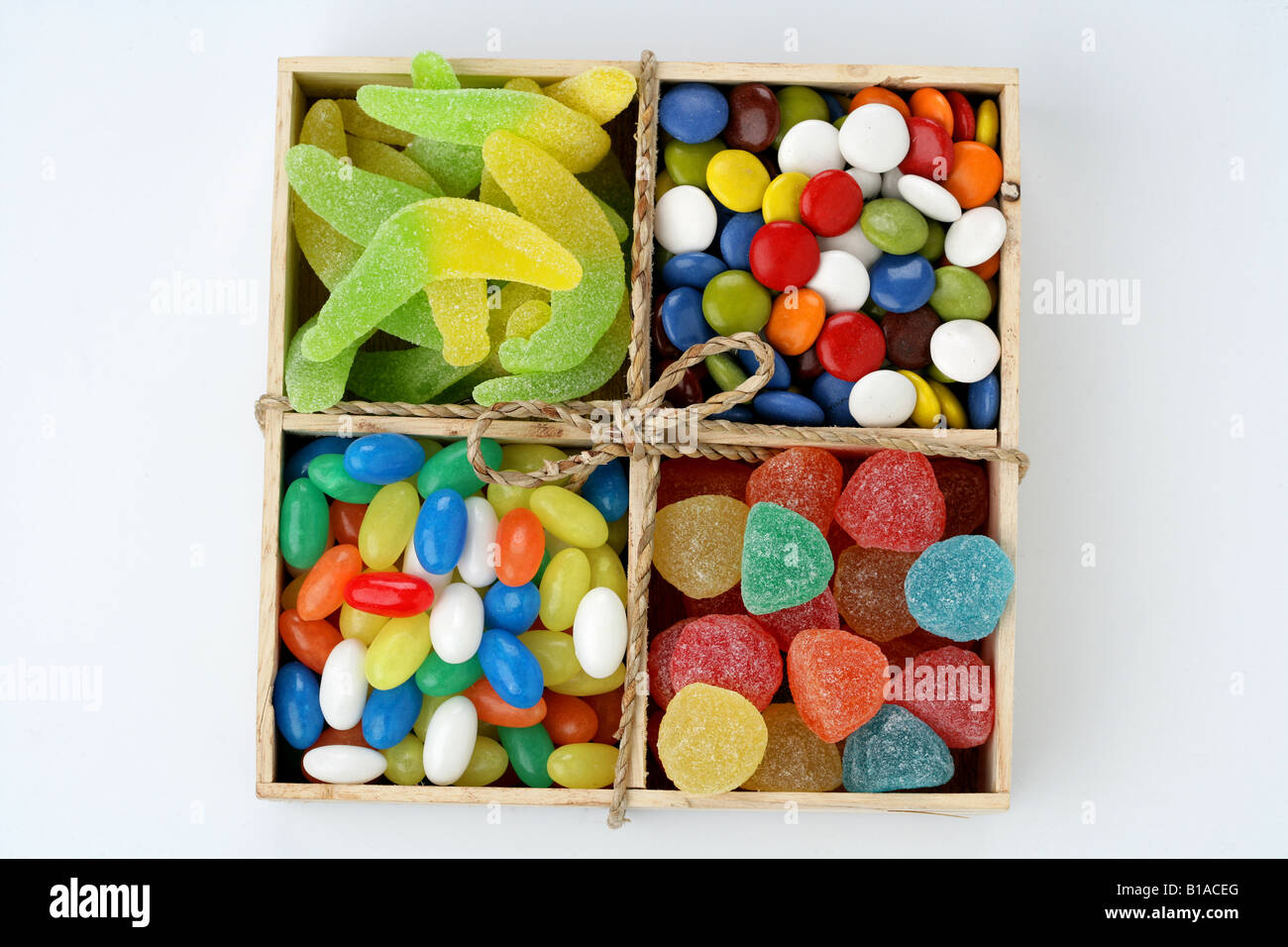 Wooden box with assorted candies (zhenital Stock Photo - Alamy