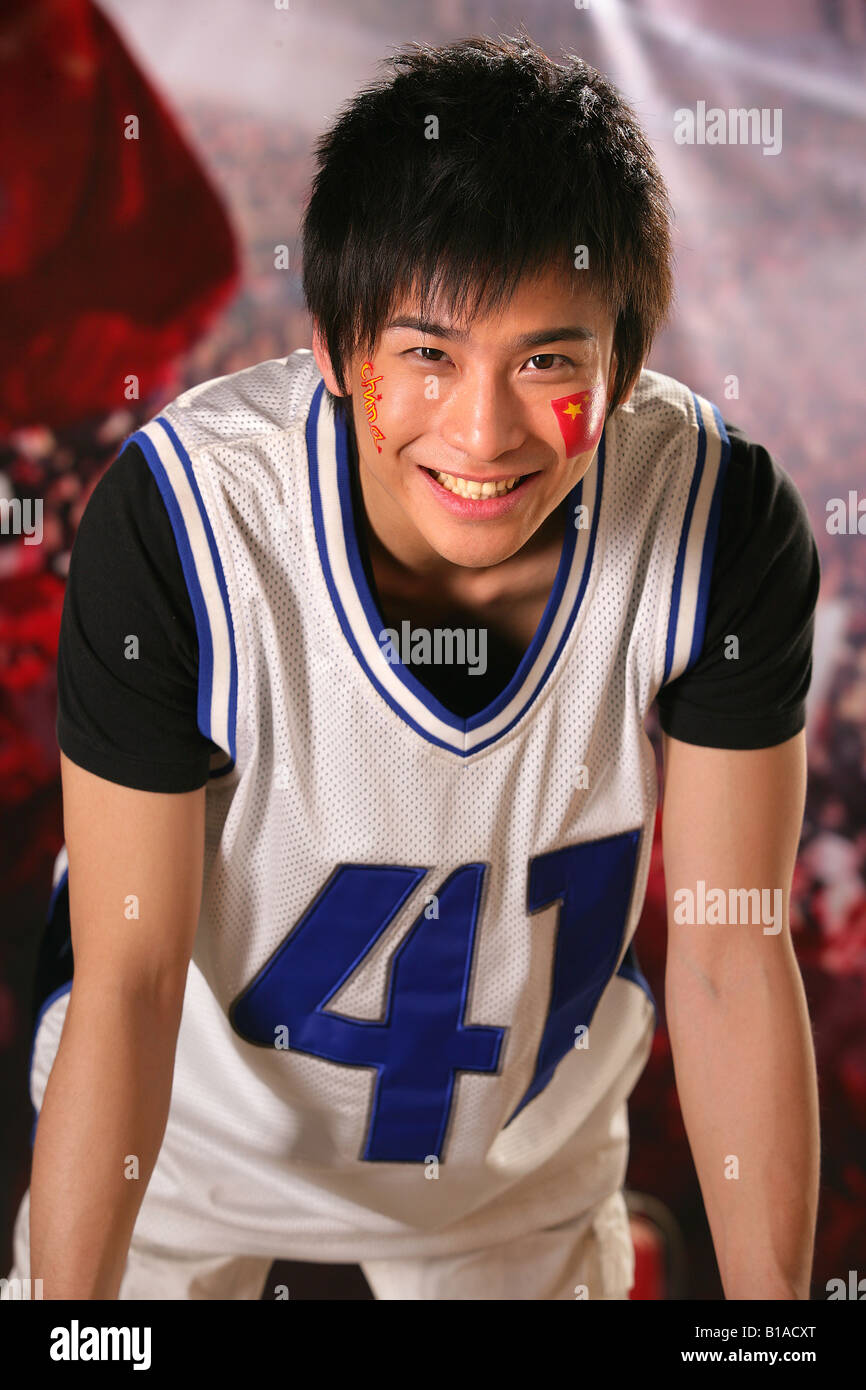 boy cheering in stadium Stock Photo - Alamy