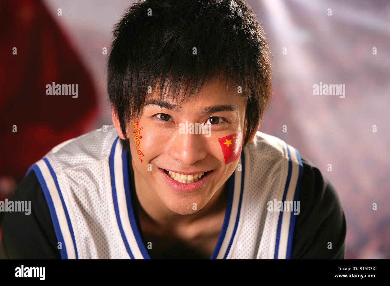 boy cheering in stadium Stock Photo - Alamy