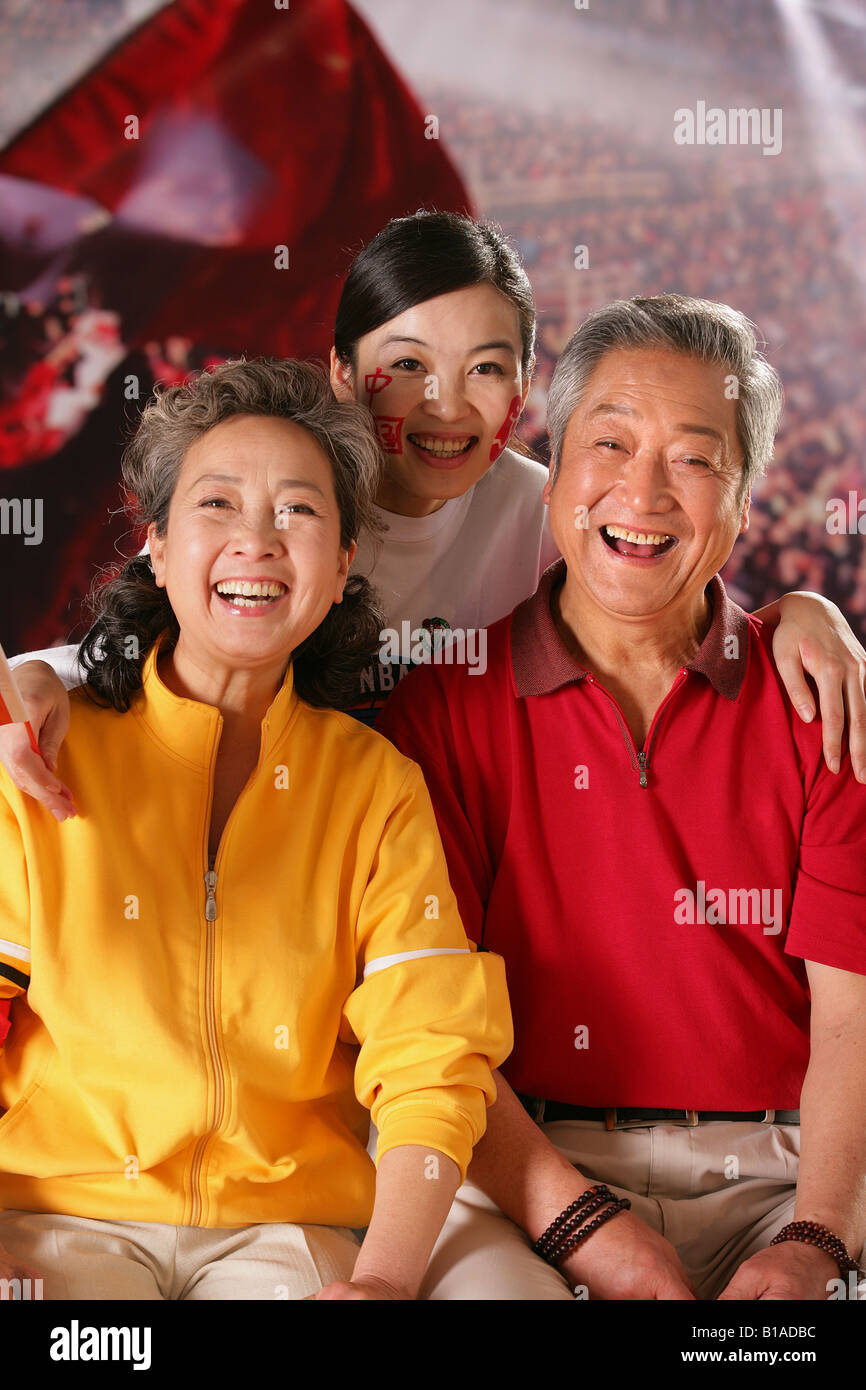family in stadium and cheering Stock Photo - Alamy