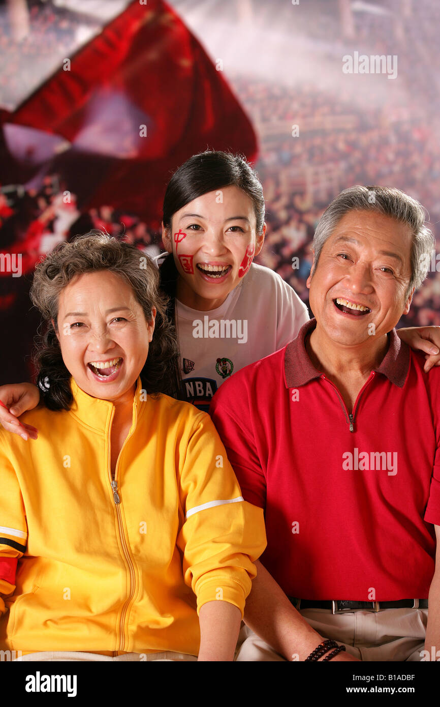 family in stadium and cheering Stock Photo - Alamy