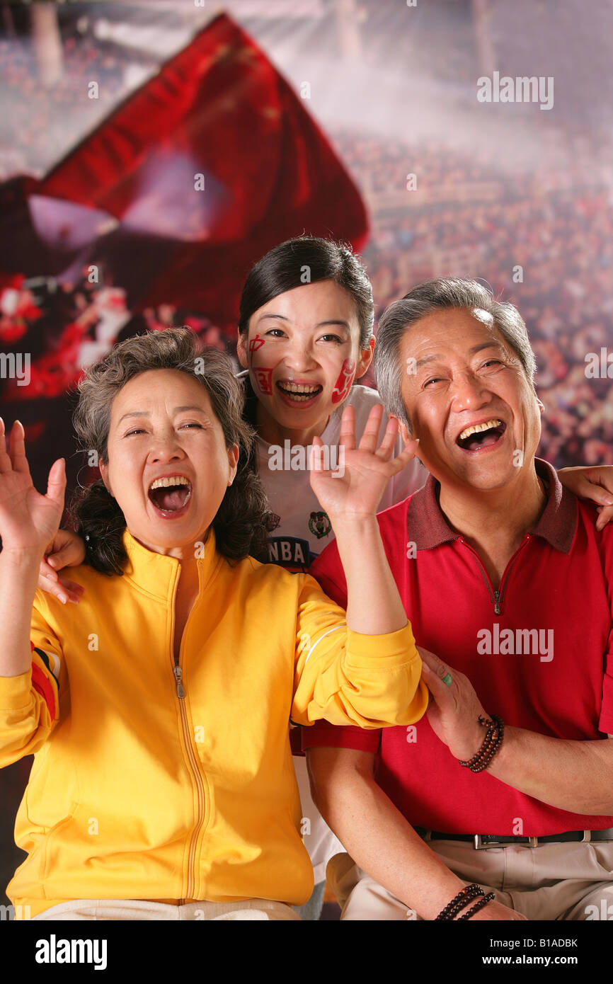 family in stadium and cheering Stock Photo - Alamy