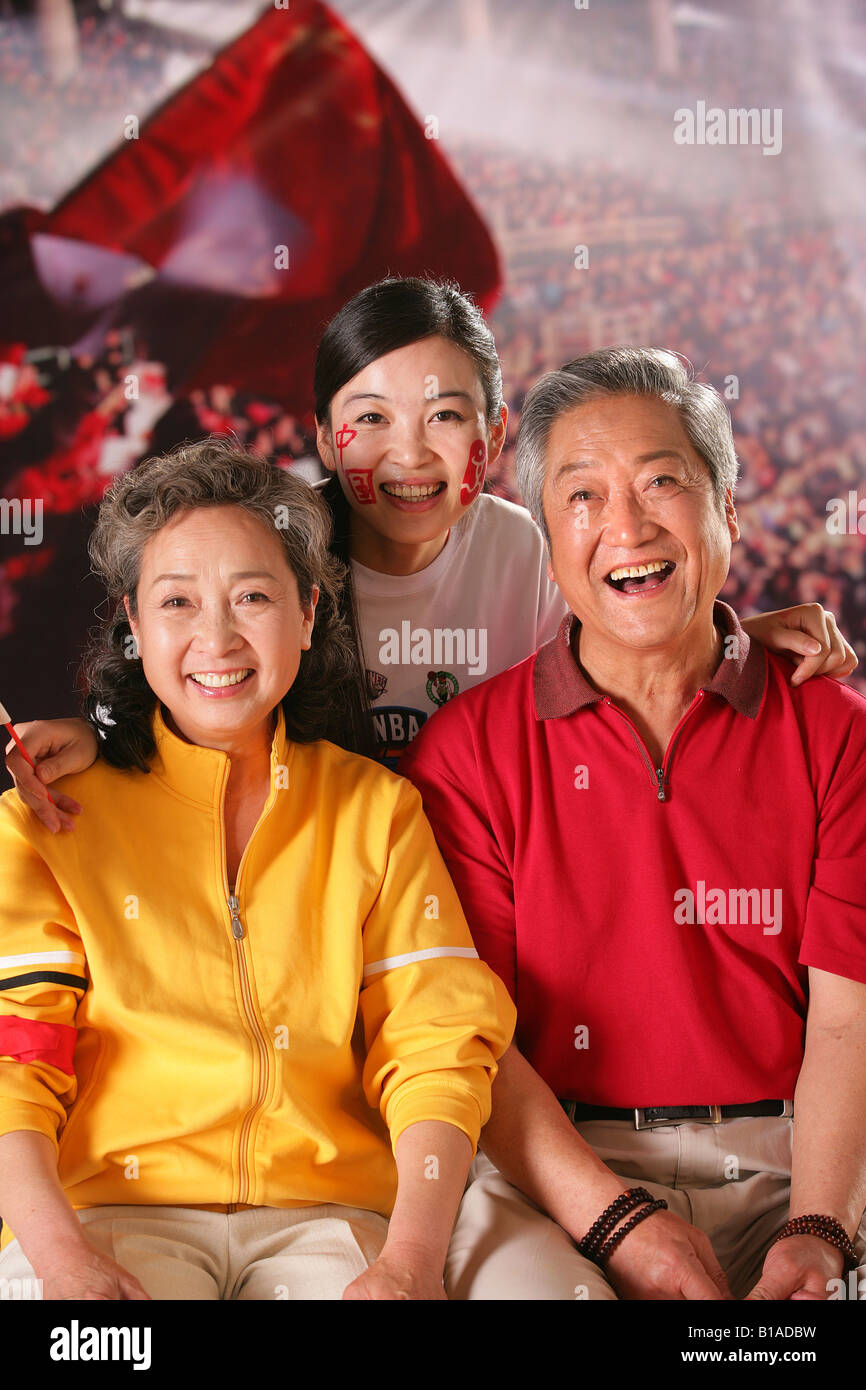 family in stadium and cheering Stock Photo - Alamy