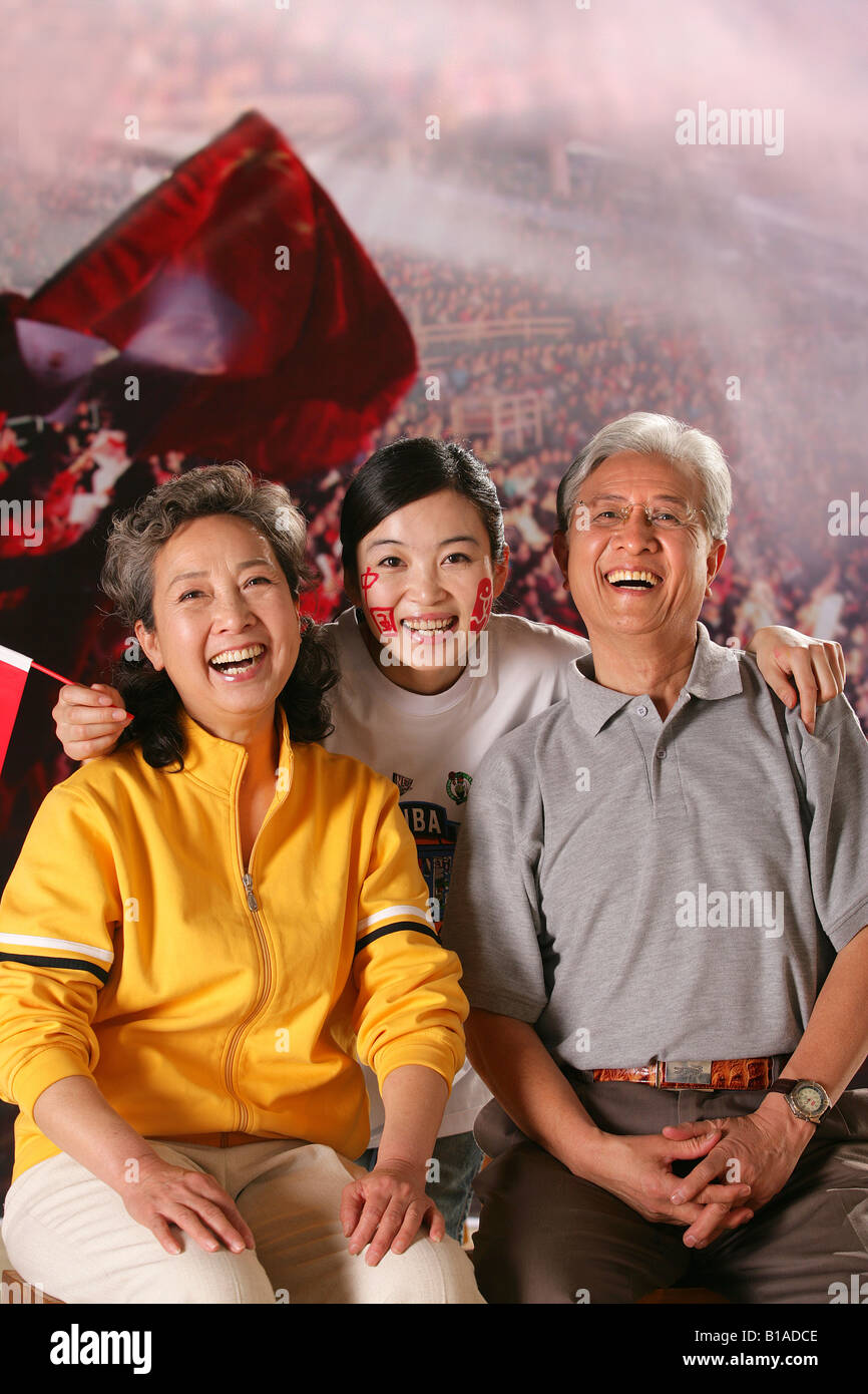family in stadium and cheering Stock Photo - Alamy