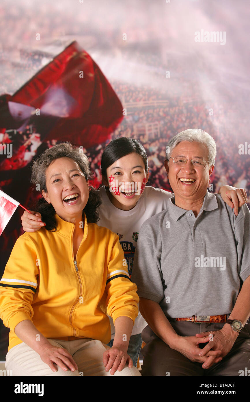 family in stadium and cheering Stock Photo - Alamy