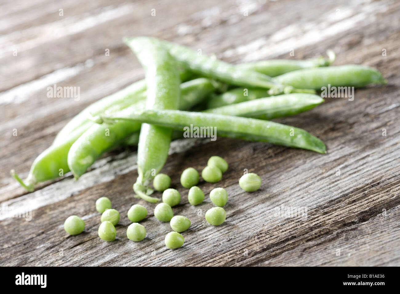 Fresh podded peas Stock Photo - Alamy