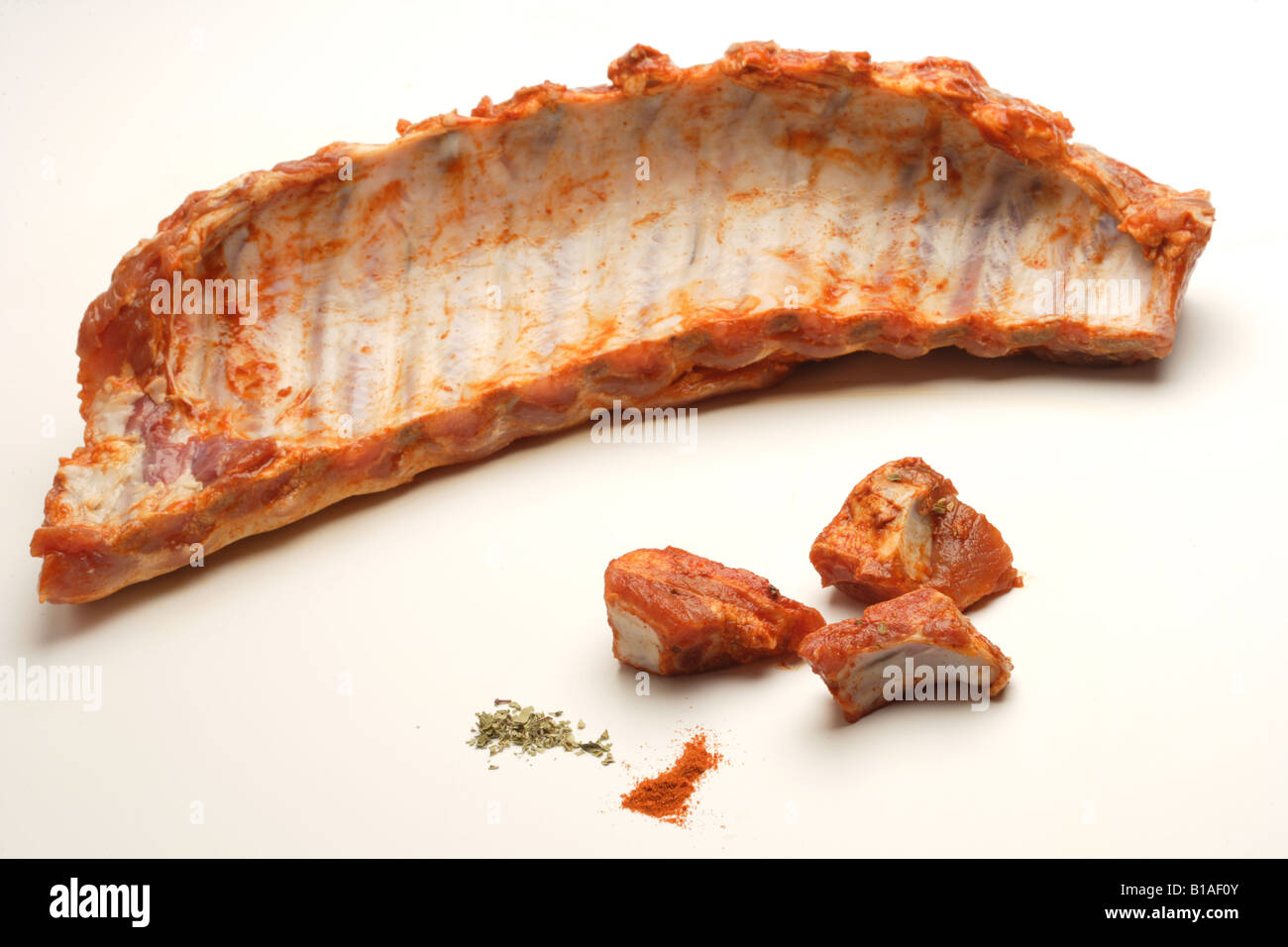 Fresh marinated rack of pork Stock Photo - Alamy