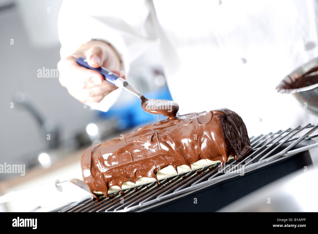 Chef making chocolate cake Stock Photo - Alamy