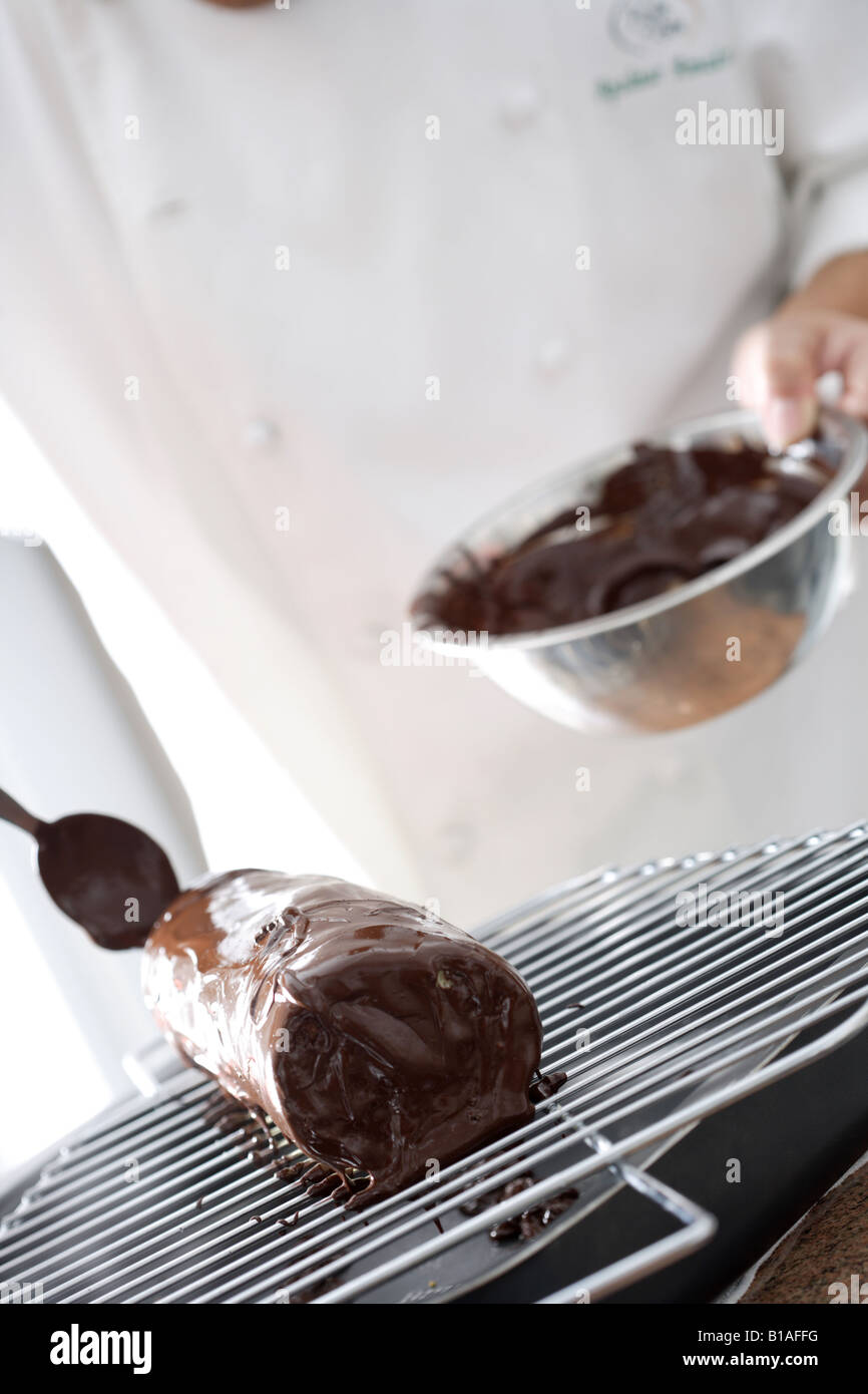 Chef making chocolate cake Stock Photo - Alamy