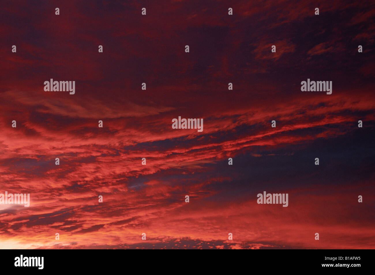 Cloudy Sky In Red Stock Photo - Alamy