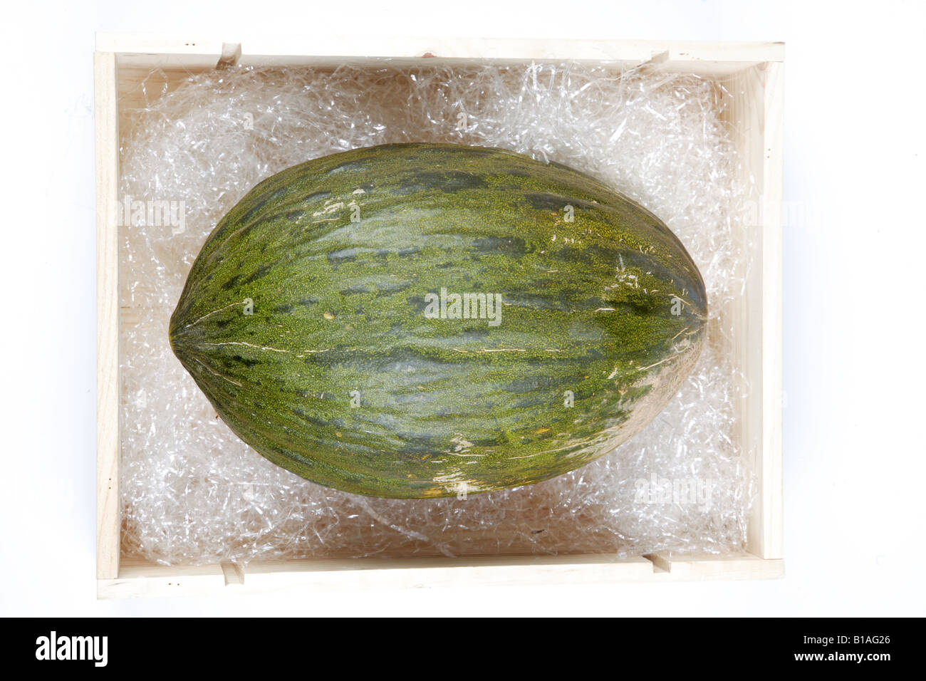 One melon in a wooden box Stock Photo - Alamy