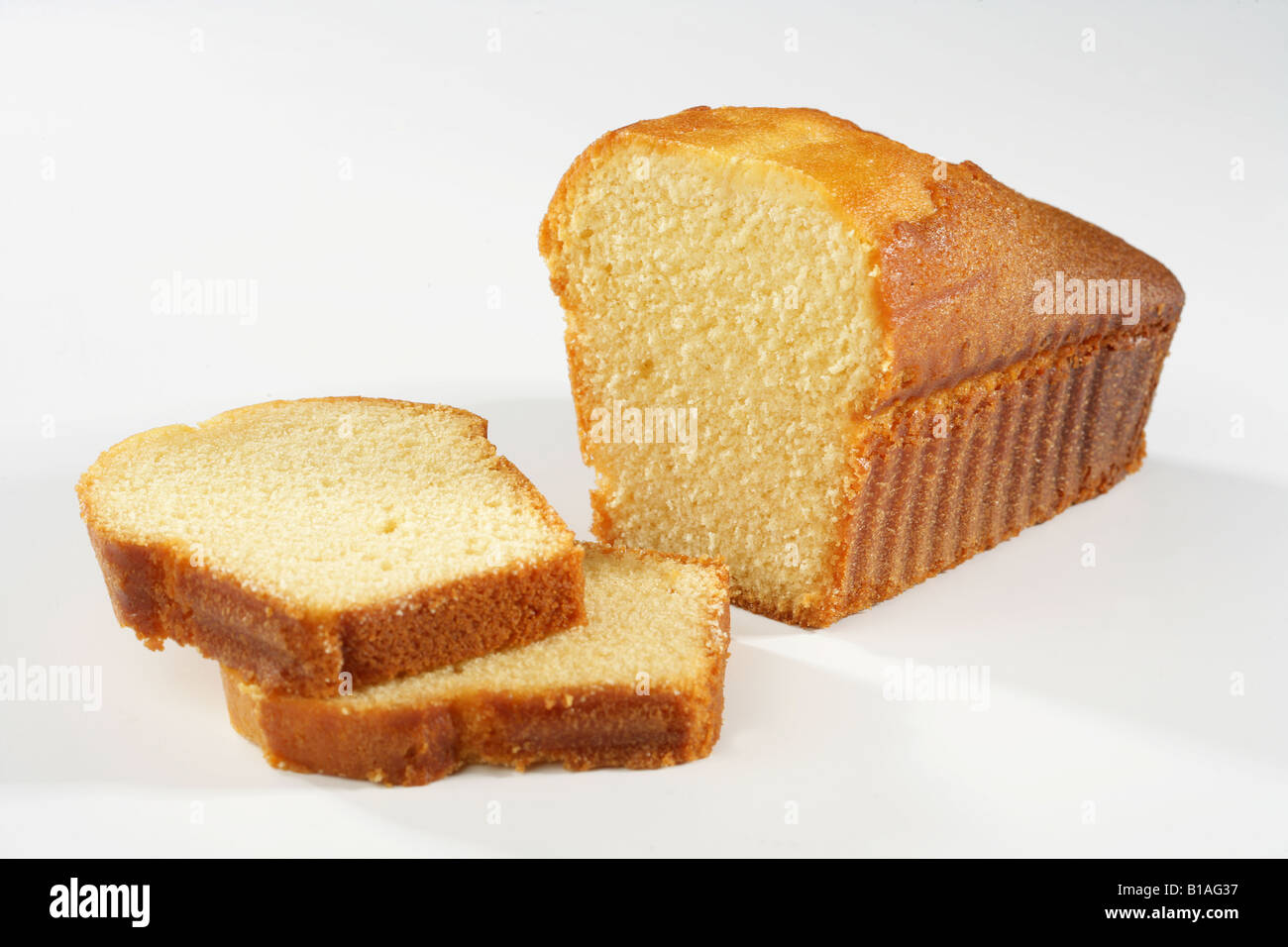 Baked cake with two slices Stock Photo - Alamy