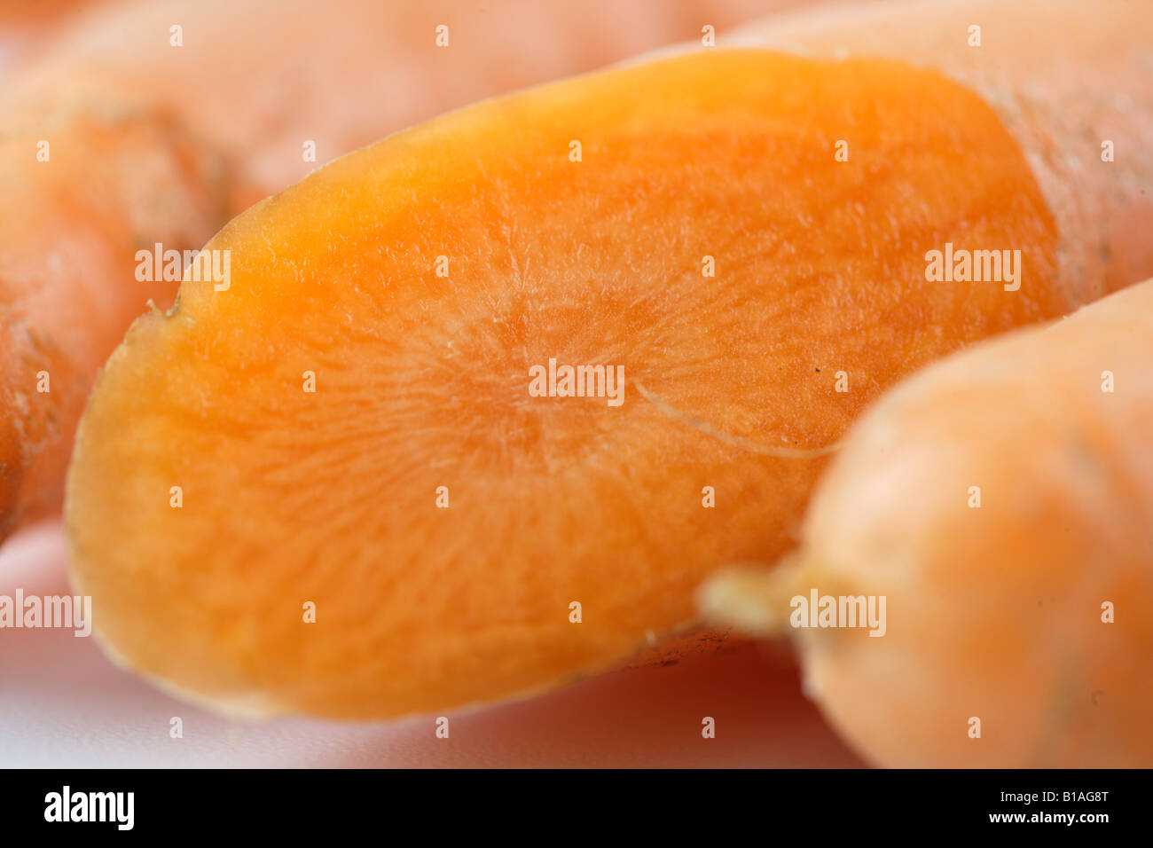 Cut open carrot close up Stock Photo - Alamy