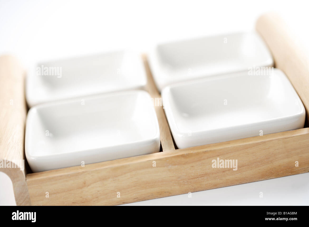 Empty appetizer square plates Stock Photo - Alamy
