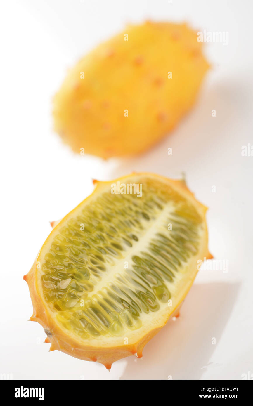 A whole kiwano and a kiwano cut in half Stock Photo - Alamy
