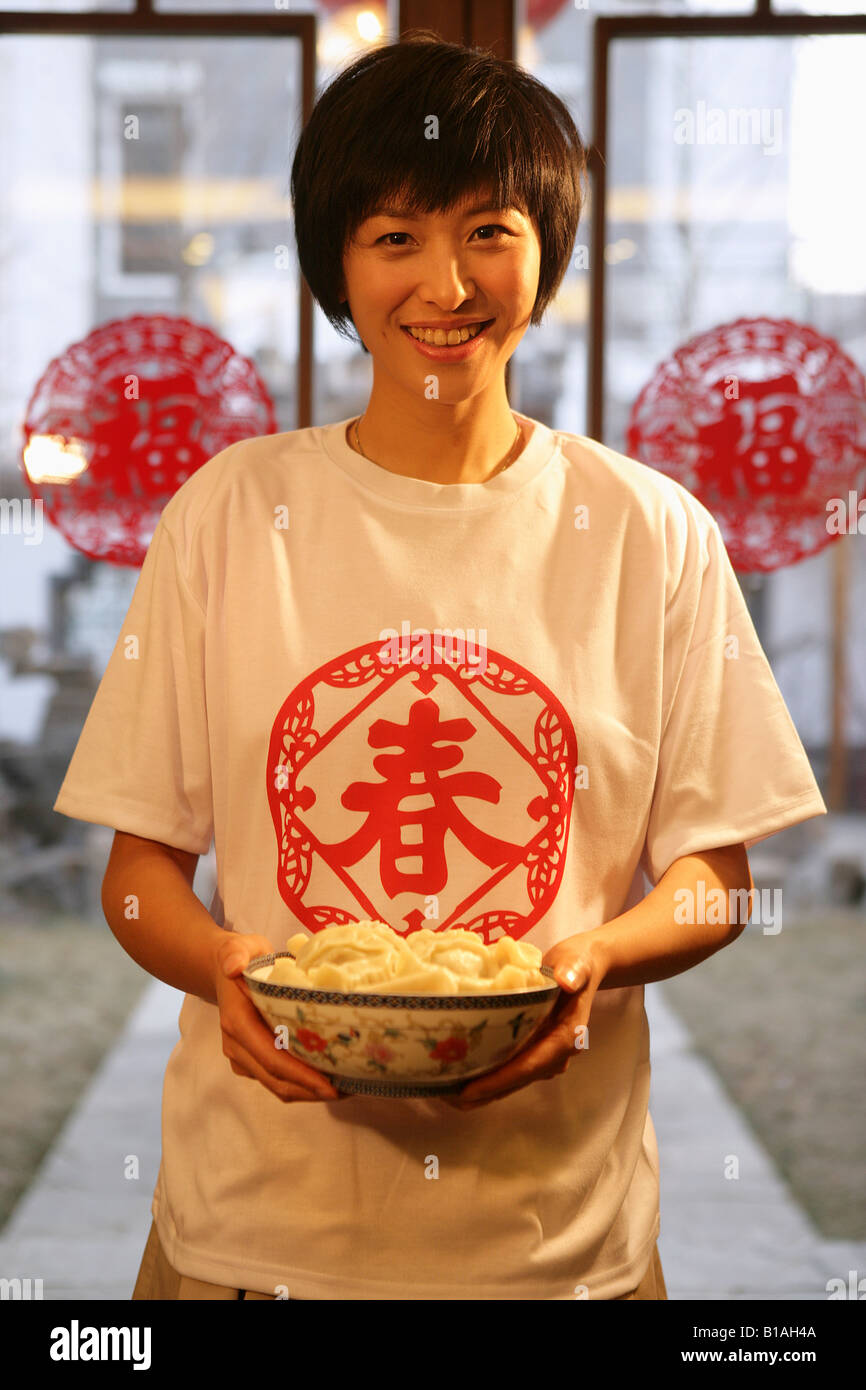 Woman chinese new year dumpling hi-res stock photography and images - Alamy