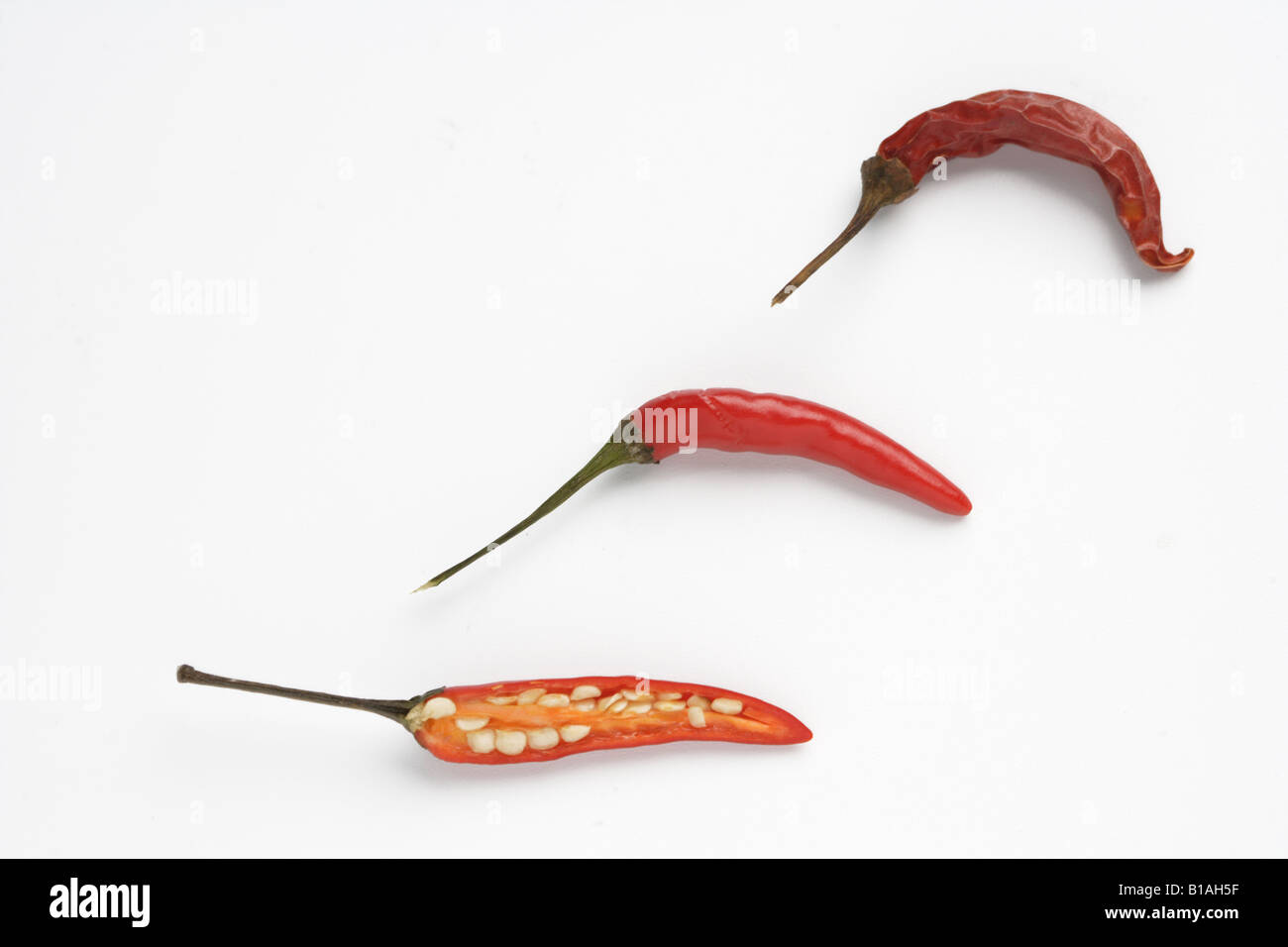 A red chili pepper cut in half Stock Photo - Alamy