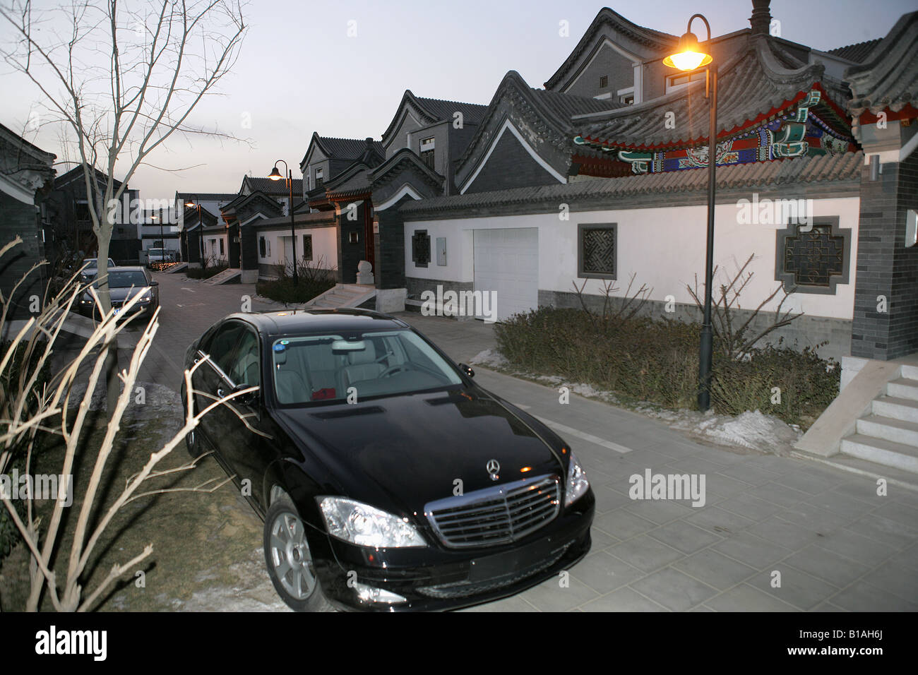 a car parking in front of traditional chinese house Stock Photo - Alamy