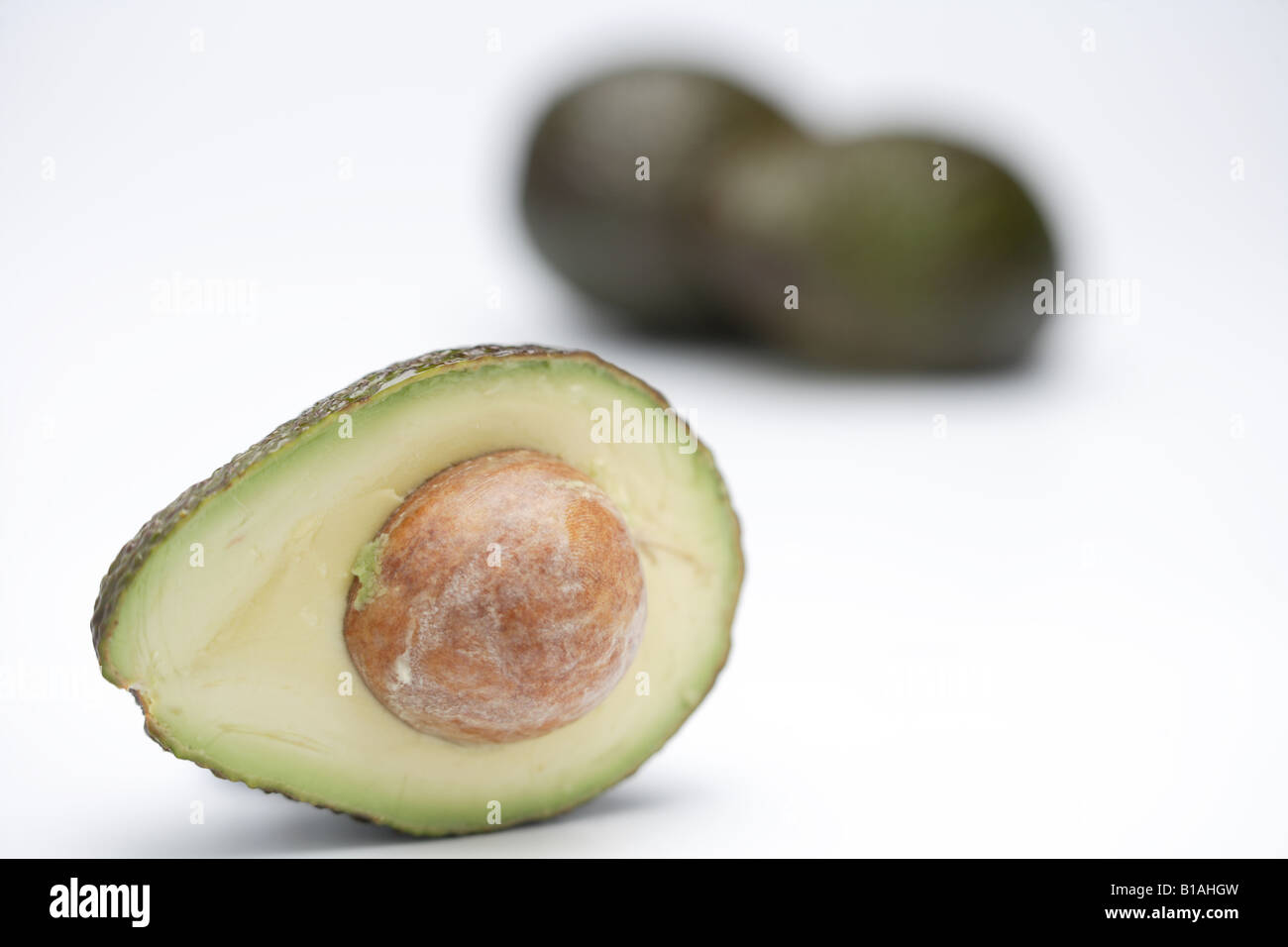 An avocado cut in half Stock Photo - Alamy