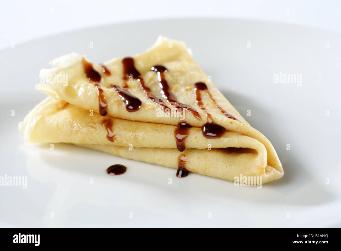 Crepe with caramel syrup Stock Photo - Alamy