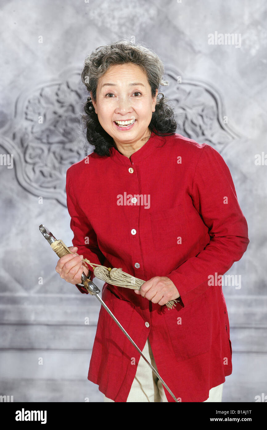 Standing senior chinese woman hi-res stock photography and images - Alamy
