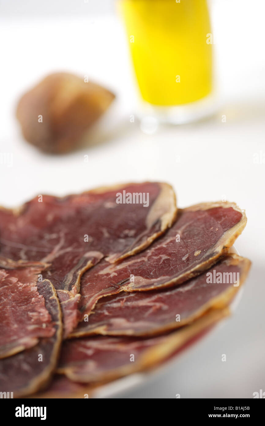 Slices of Cecina from Leon (air dried and smoked cured beef made from ...
