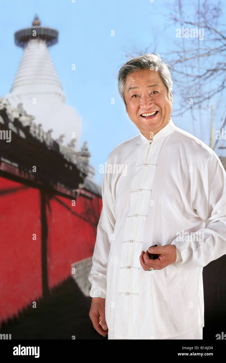 Standing in front of temple Cut Out Stock Images & Pictures - Alamy