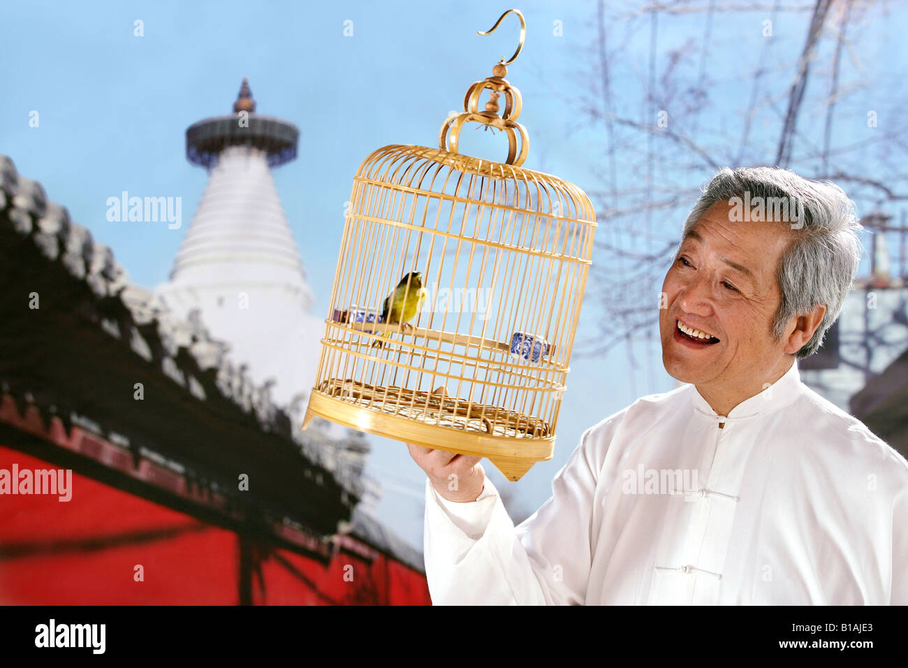 Man holding birdcage hi-res stock photography and images - Alamy