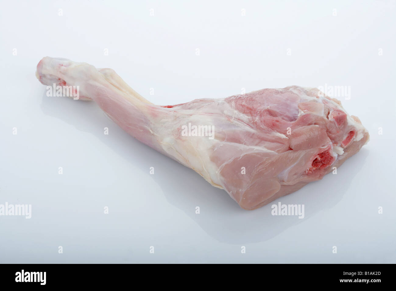 Raw leg of lamb Stock Photo - Alamy