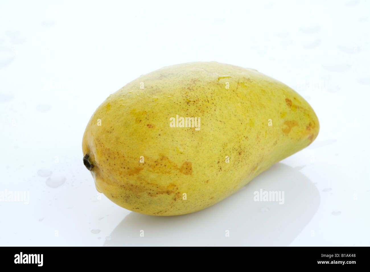 Uncut mango hi-res stock photography and images - Alamy