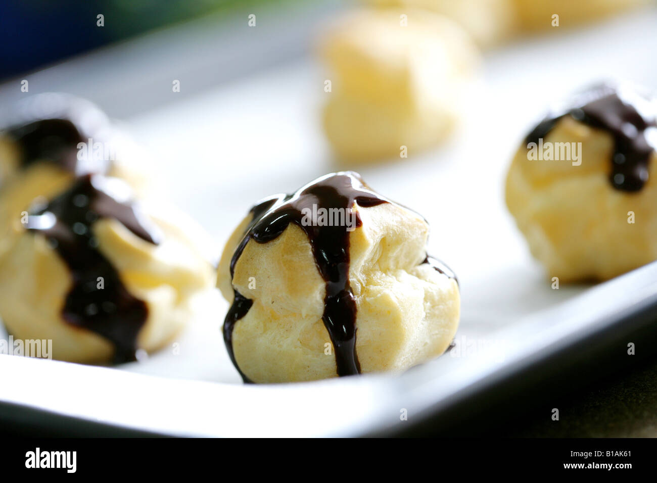 Filled with cream profiteroles Stock Photo - Alamy