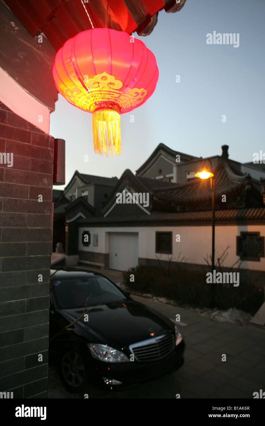 a car parking in front of traditional chinese house Stock Photo - Alamy