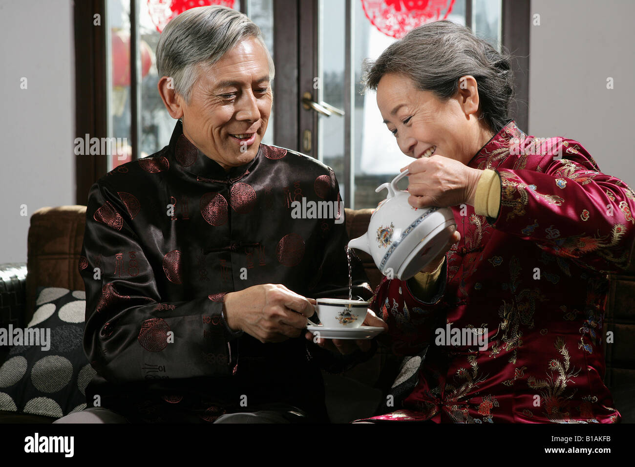 Close up couple pouring tea hi-res stock photography and images - Alamy