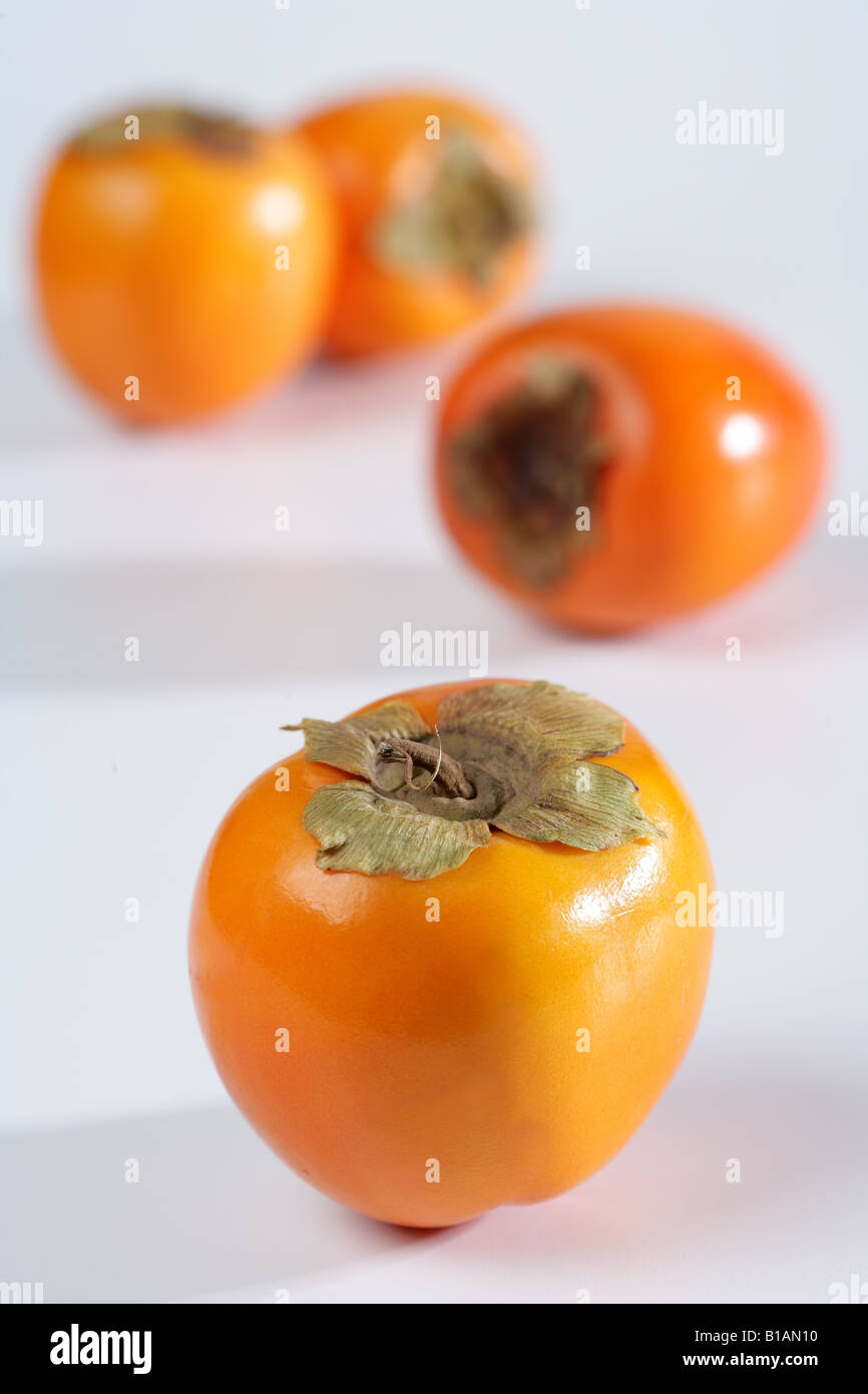 Kaki persimmon or sharon fruits Stock Photo - Alamy