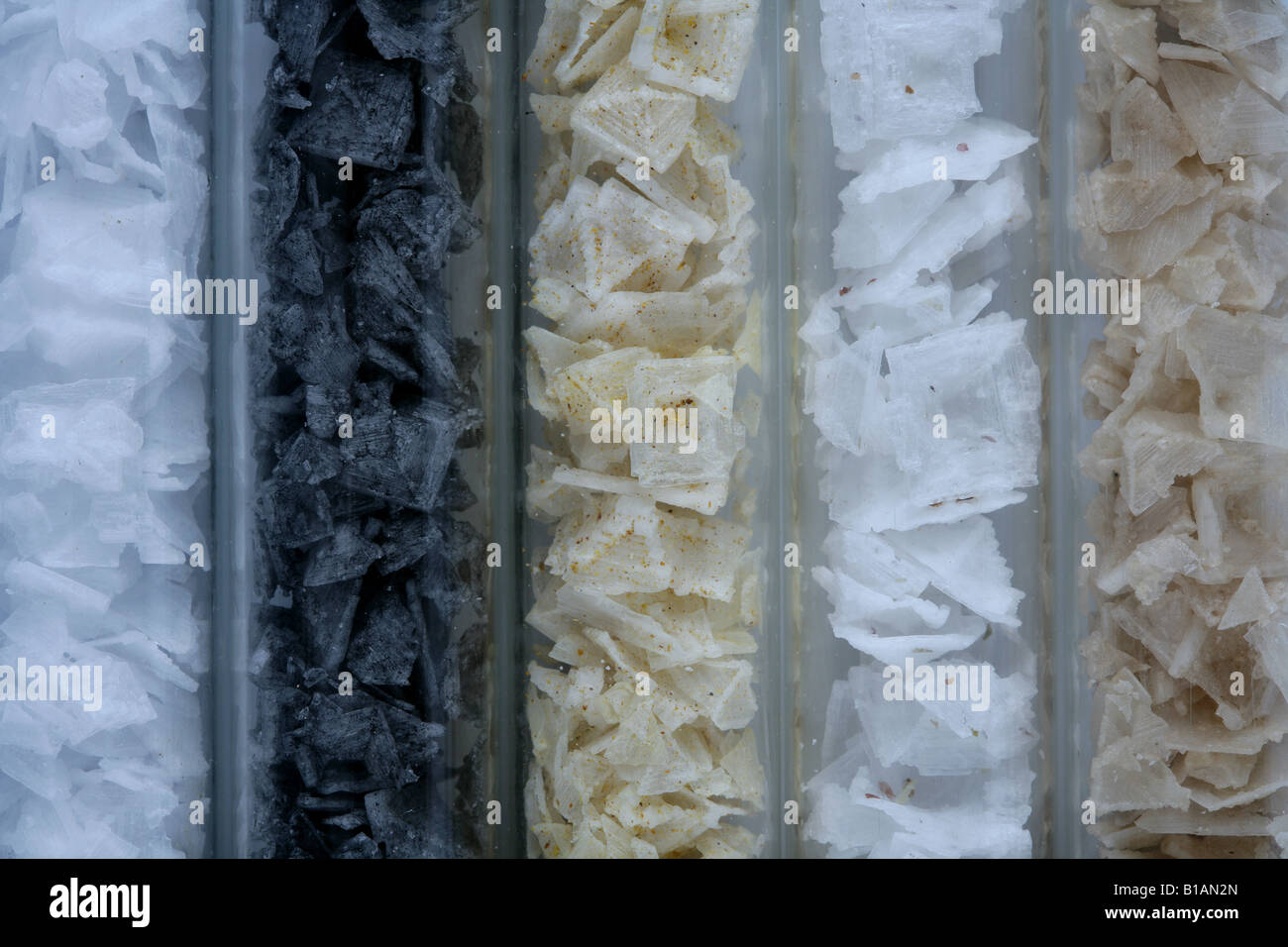 Assorted crystal salt in test tubes Stock Photo - Alamy