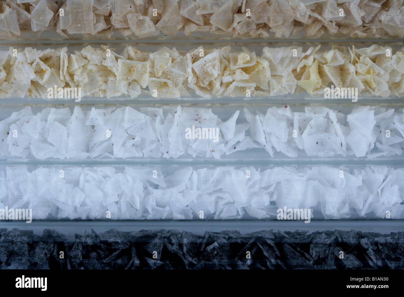 Assorted crystal salt in test tubes Stock Photo - Alamy