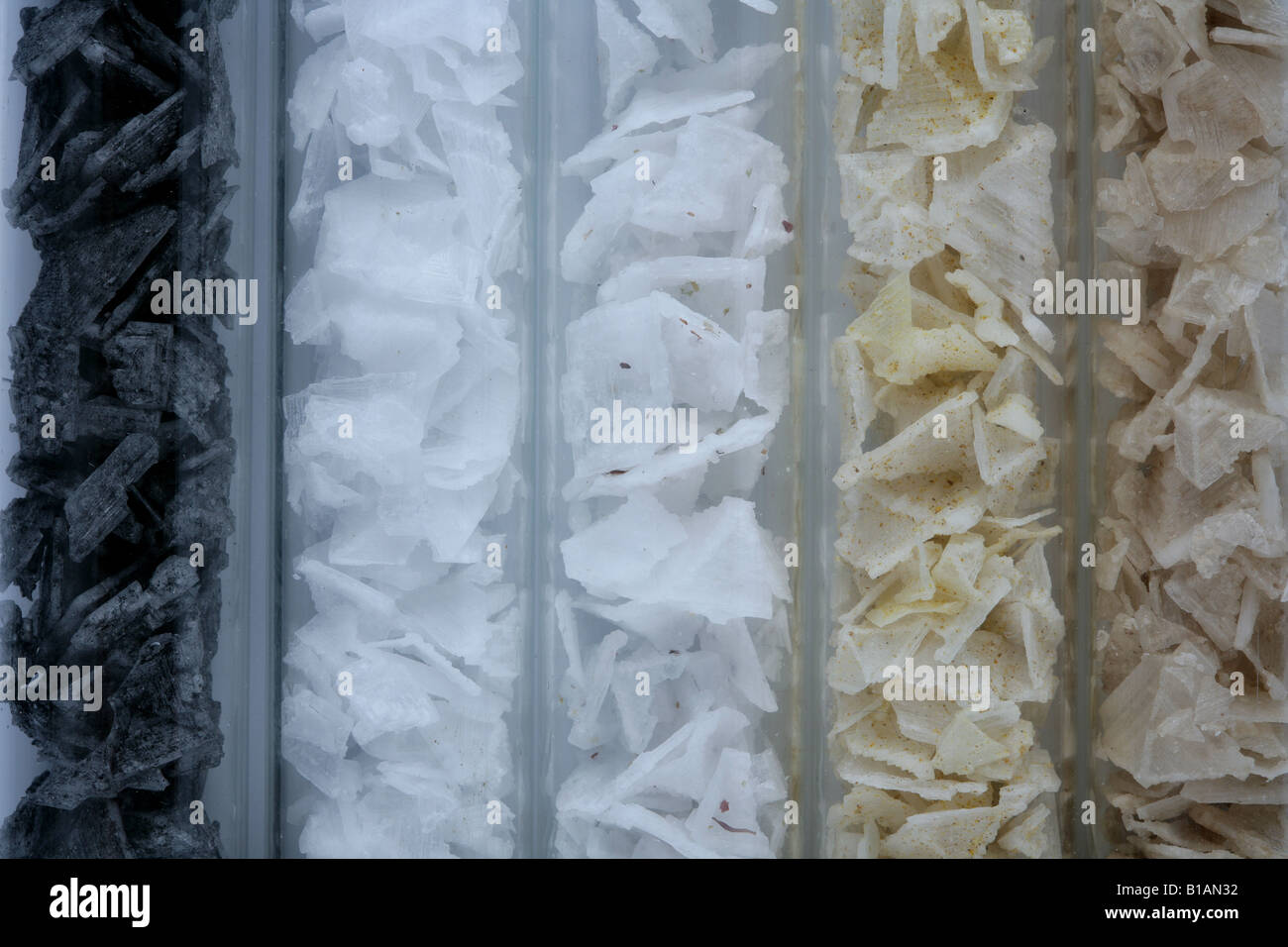 Assorted crystal salt in test tubes Stock Photo - Alamy